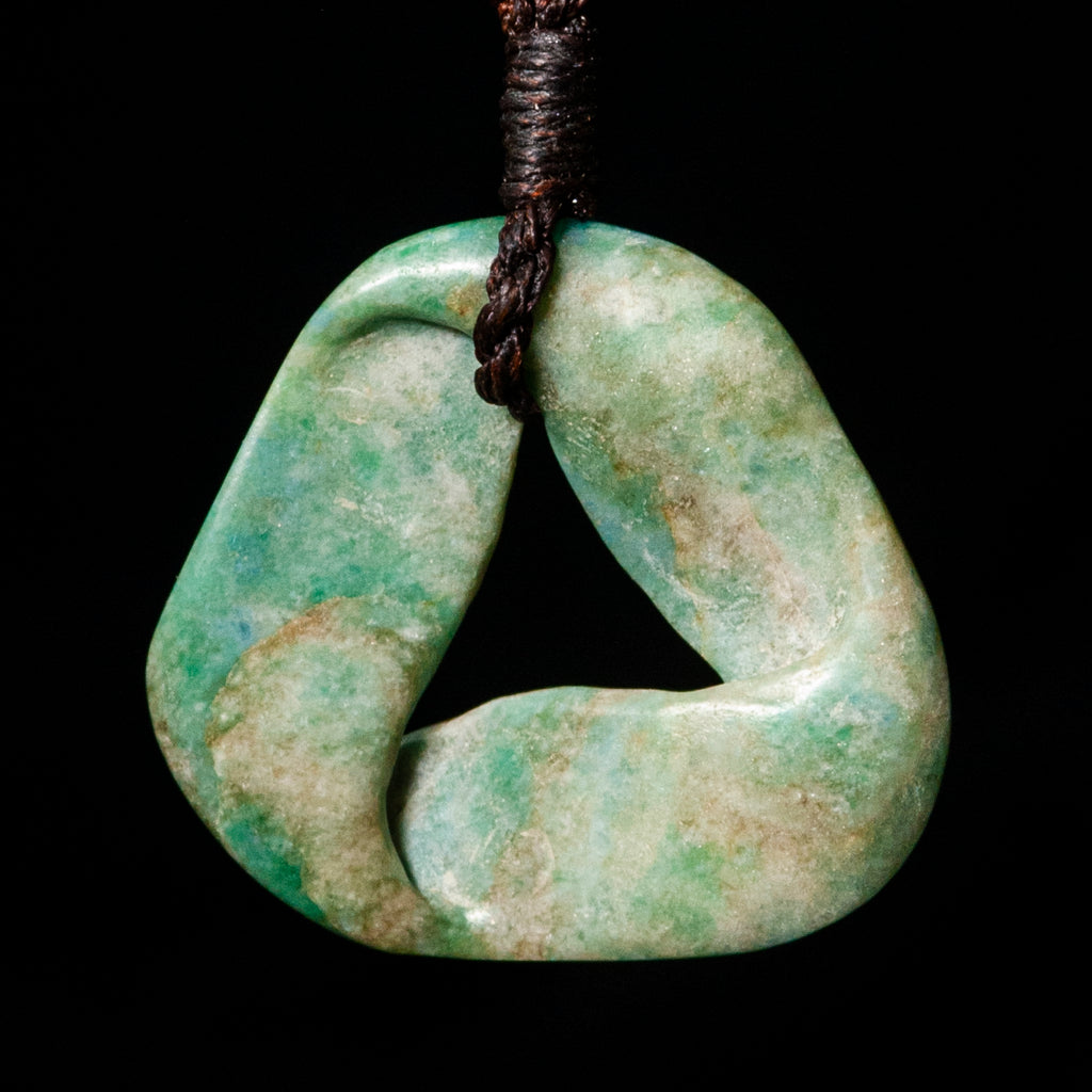 Handcrafted Aotea Squashed Mobius form pendant – The Bone Art Place